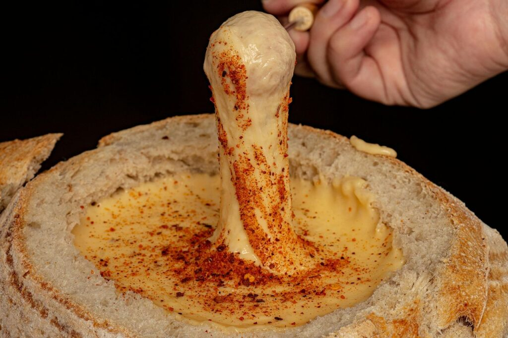 Why melted cheese became society’s universal emotional support system ...